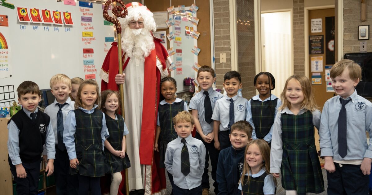 Ahead of his busy Christmas Eve, St. Nick stops to visit local Catholic ...